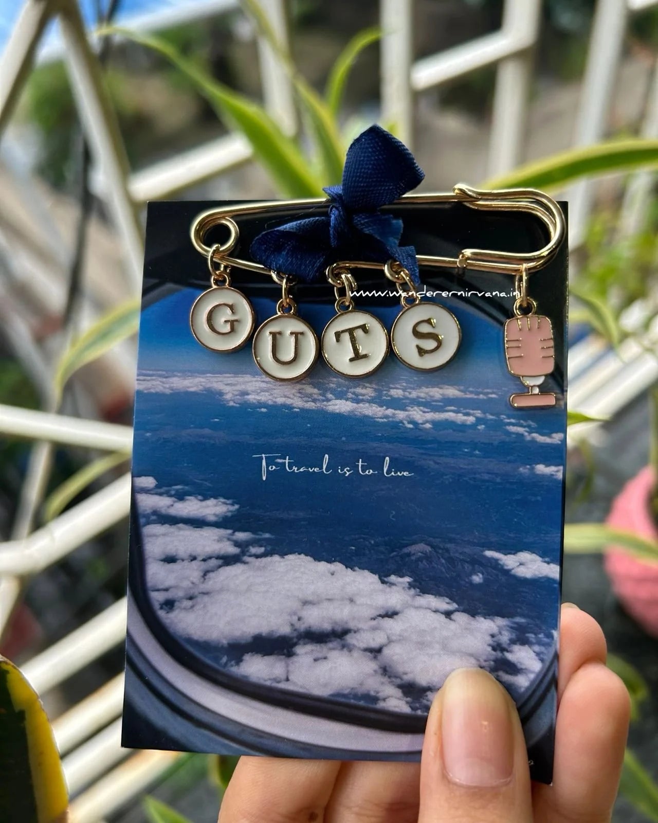 GUTS with mic Brooch – Wanderer Nirvana